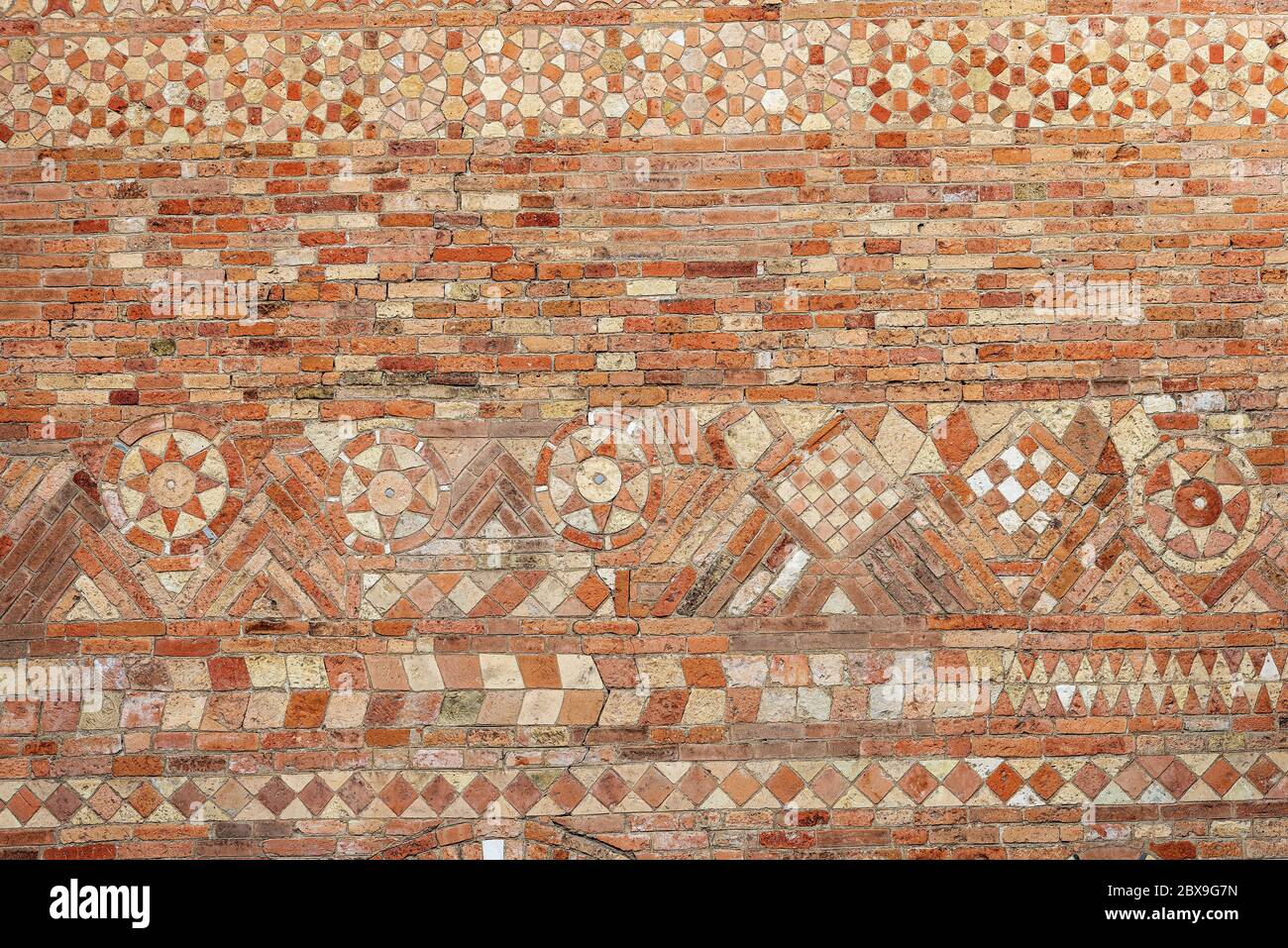 Ancient brick wall of the Basilica of Santo Stefano also called the ...