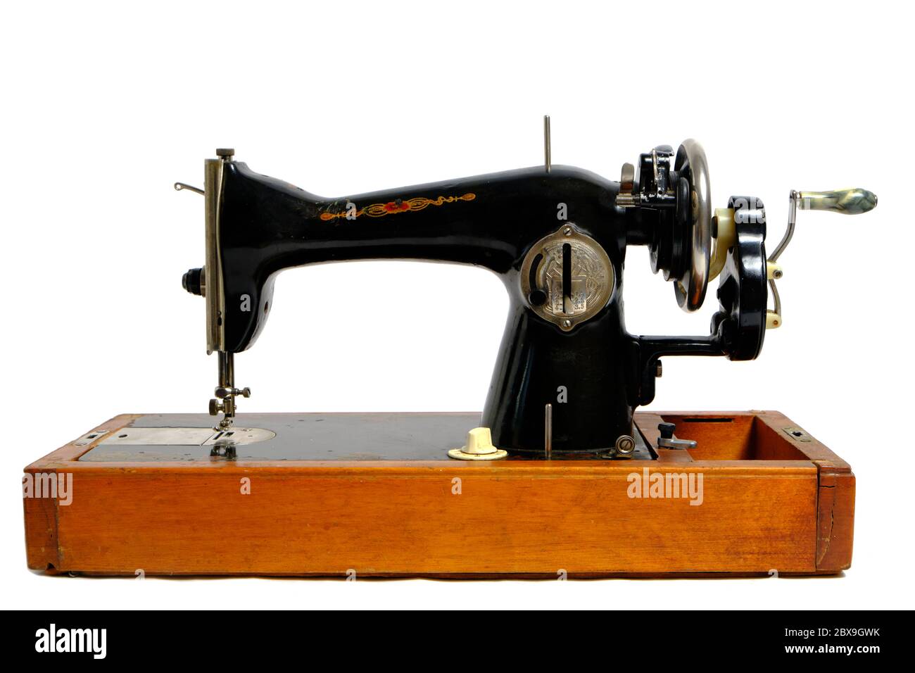 Old, retro vintage sewing machine on a white background Stock Photo - Alamy