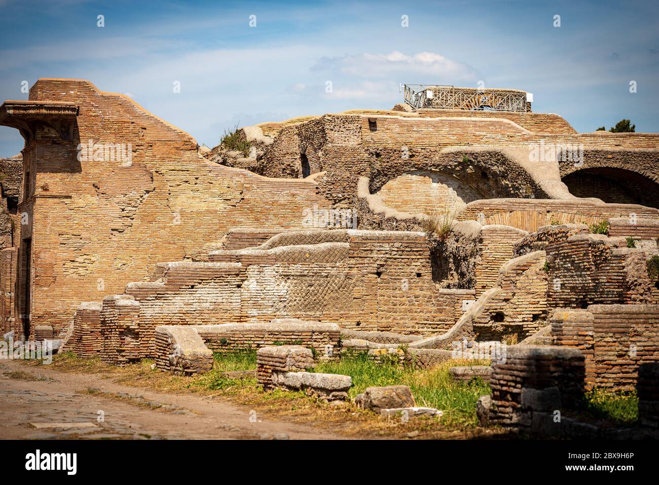 Ancient Roman buildings in Ostia Antica Archeological Site. Colony founded in the 7th century BC ...