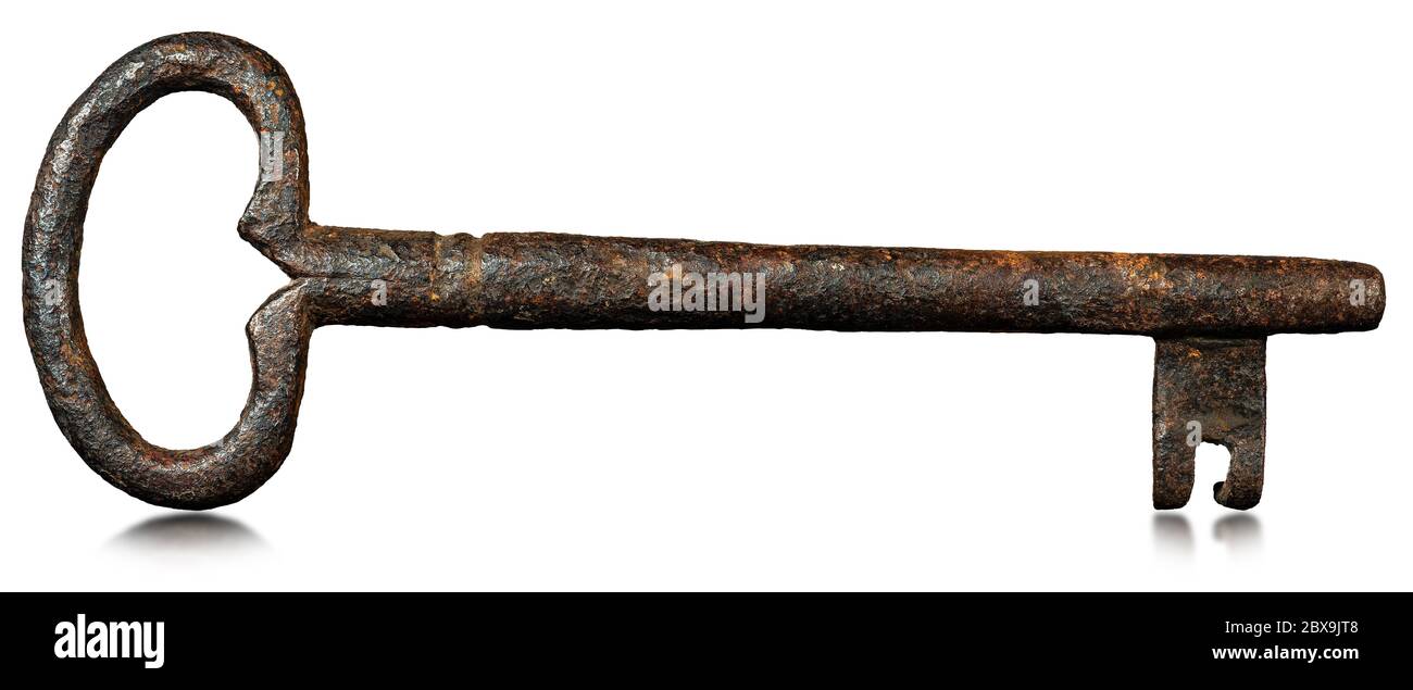 Macro photography of an old and vintage rusty key isolated on white ...