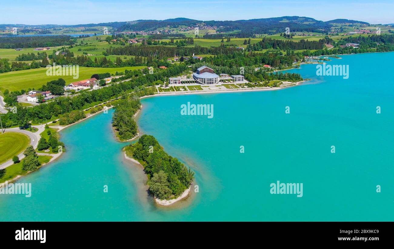 Aerial view over Lake Forggensee at the city of Fuessen in Germany ...