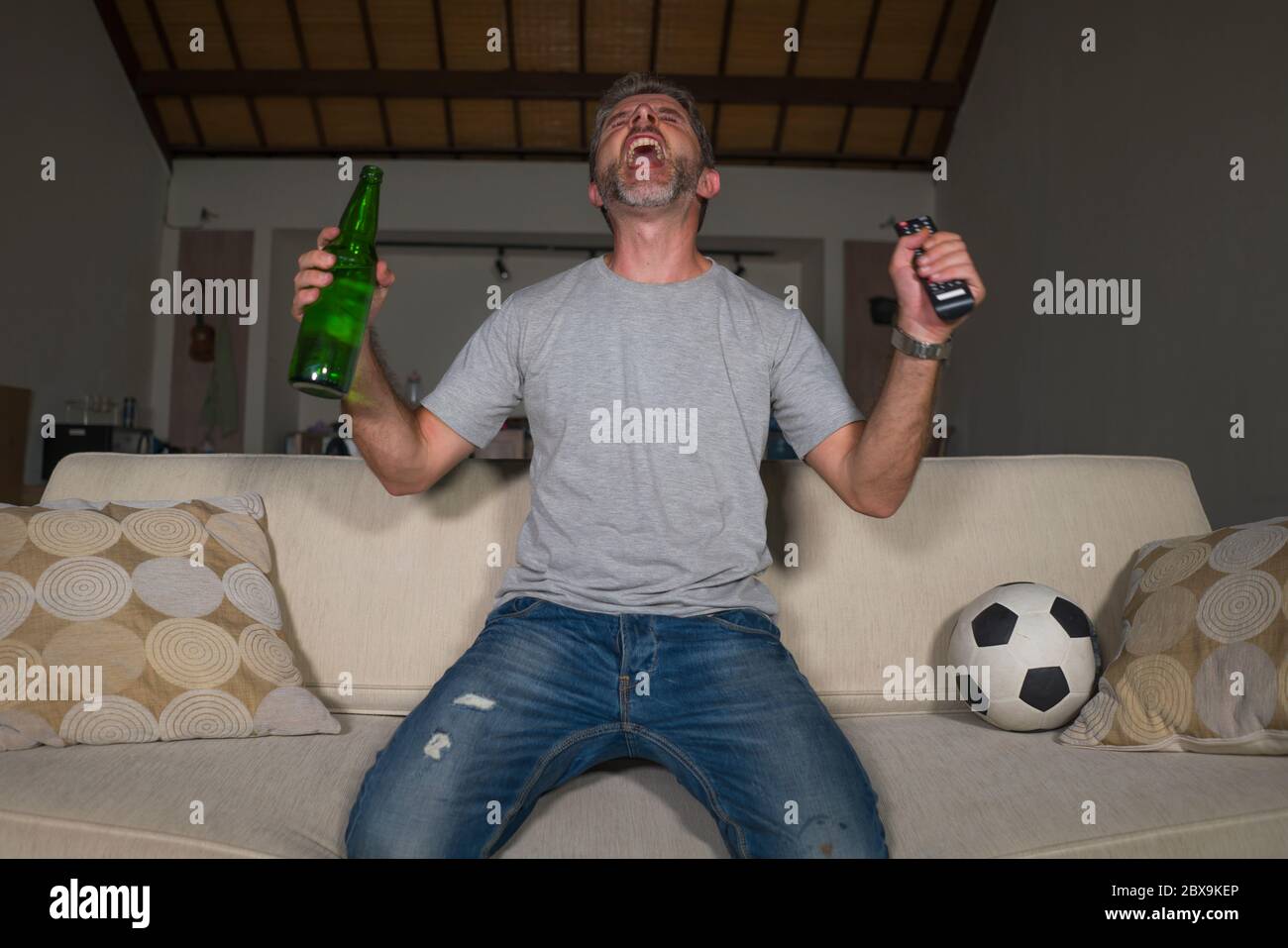Man watching football 30s hi-res stock photography and images - Alamy