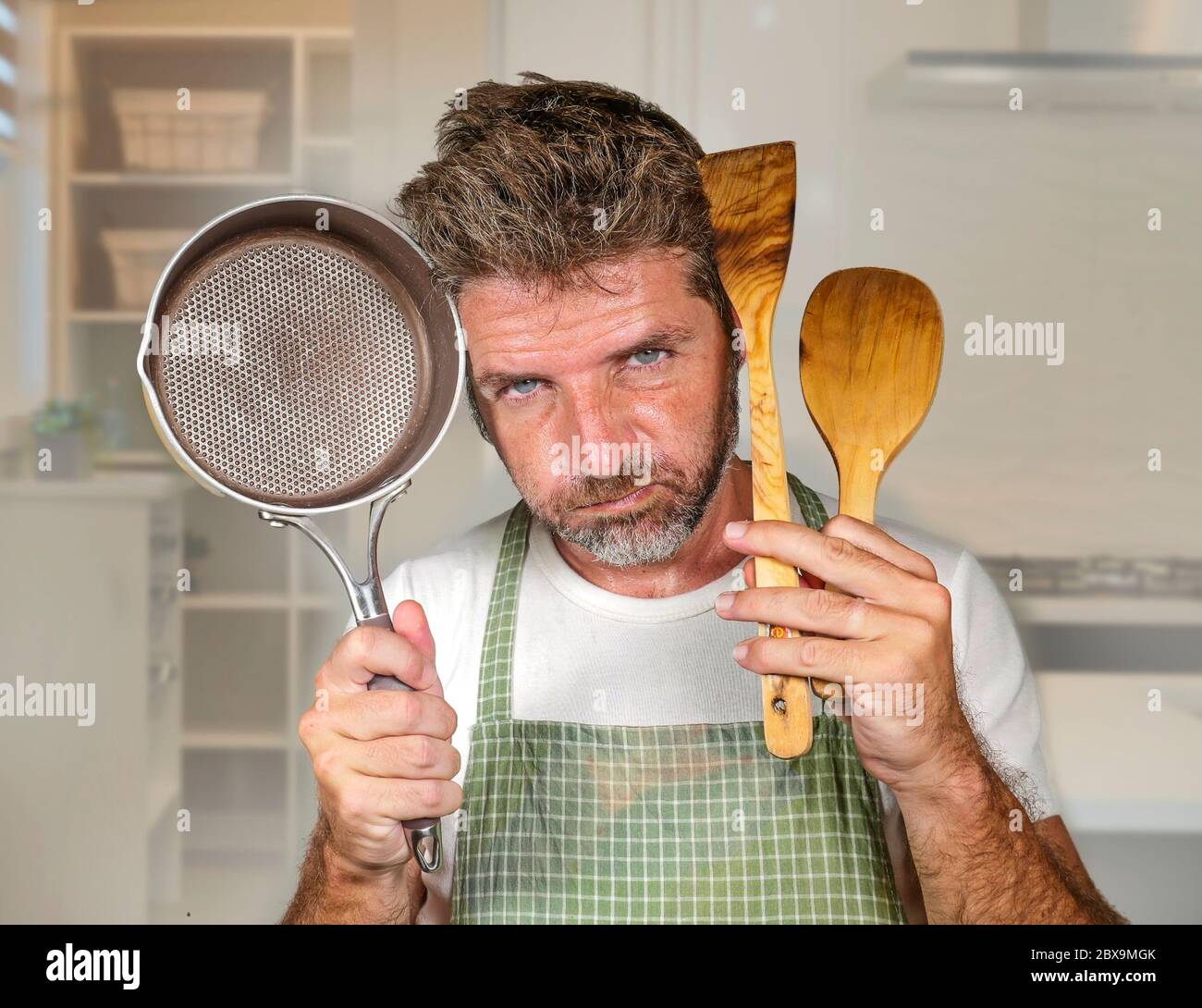 lifestyle portrait of young attractive unhappy and overwhelmed home ...