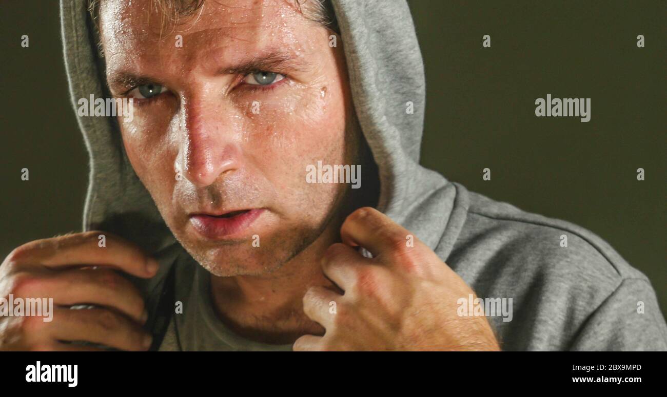 close up sweaty face portrait of young attractive and fierce looking ...