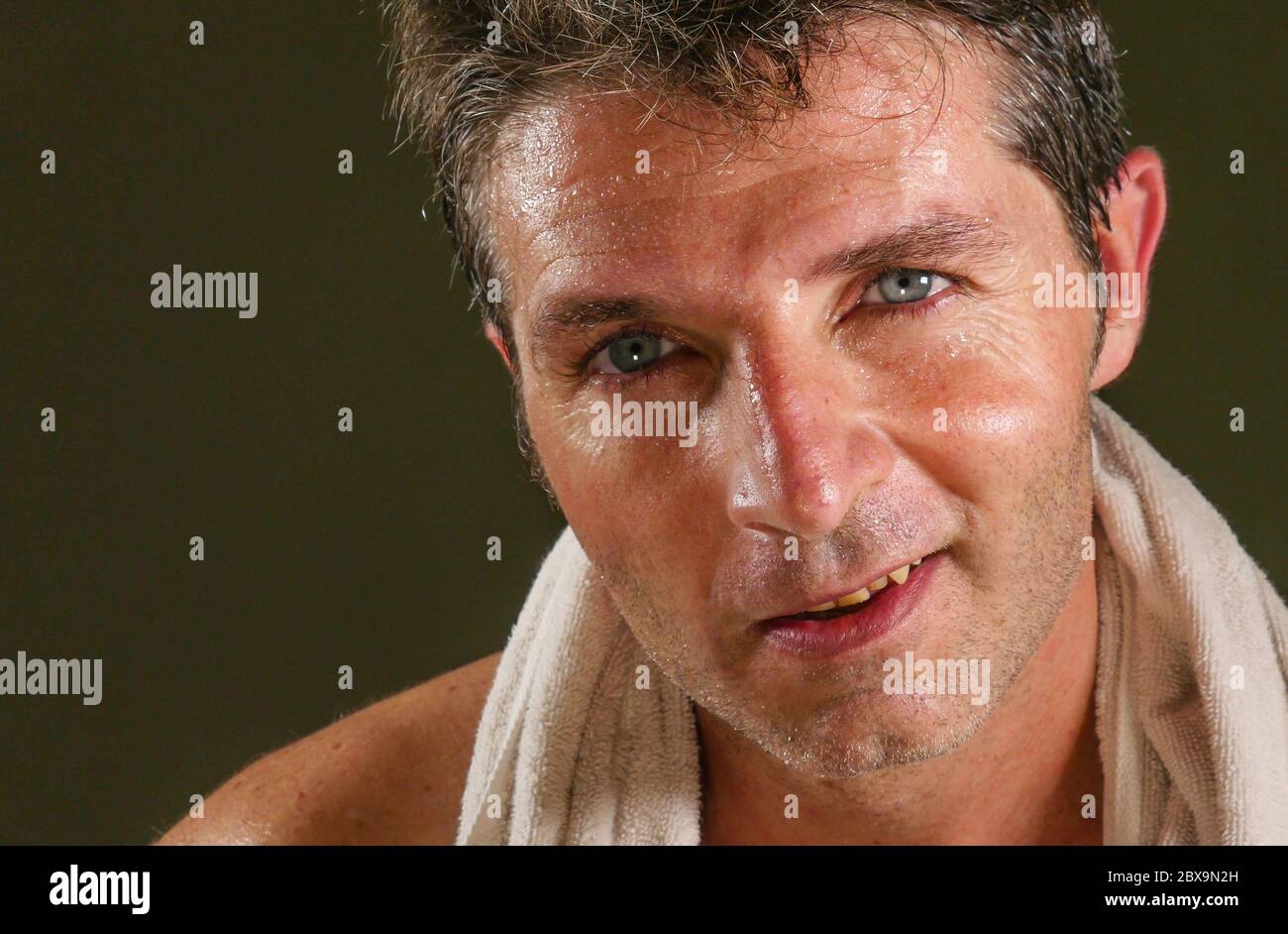 head and shoulders portrait of young attractive and handsome sport man ...