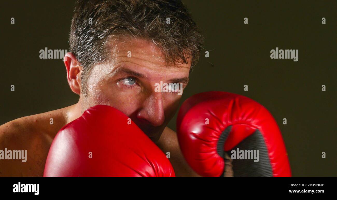 close up face portrait of young attractive and fierce looking man in ...