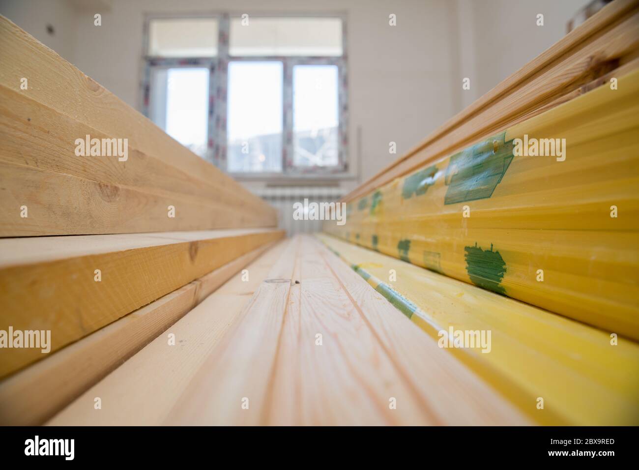 Timber industry objects. Finished wood beams or plank at a warehouse ...