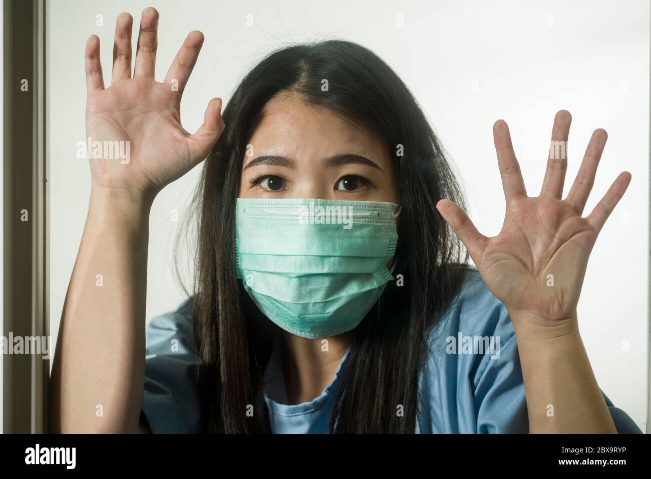 covid-19 pandemic - dramatic portrait of young scared and frightened ...