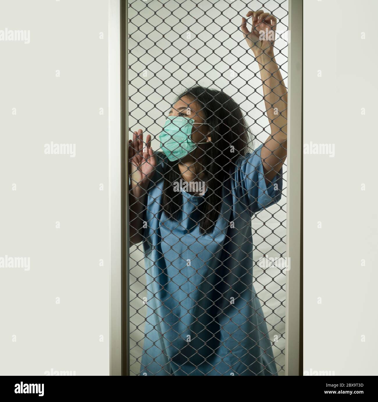 dramatic portrait of young Asian Chinese woman infected with virus ...