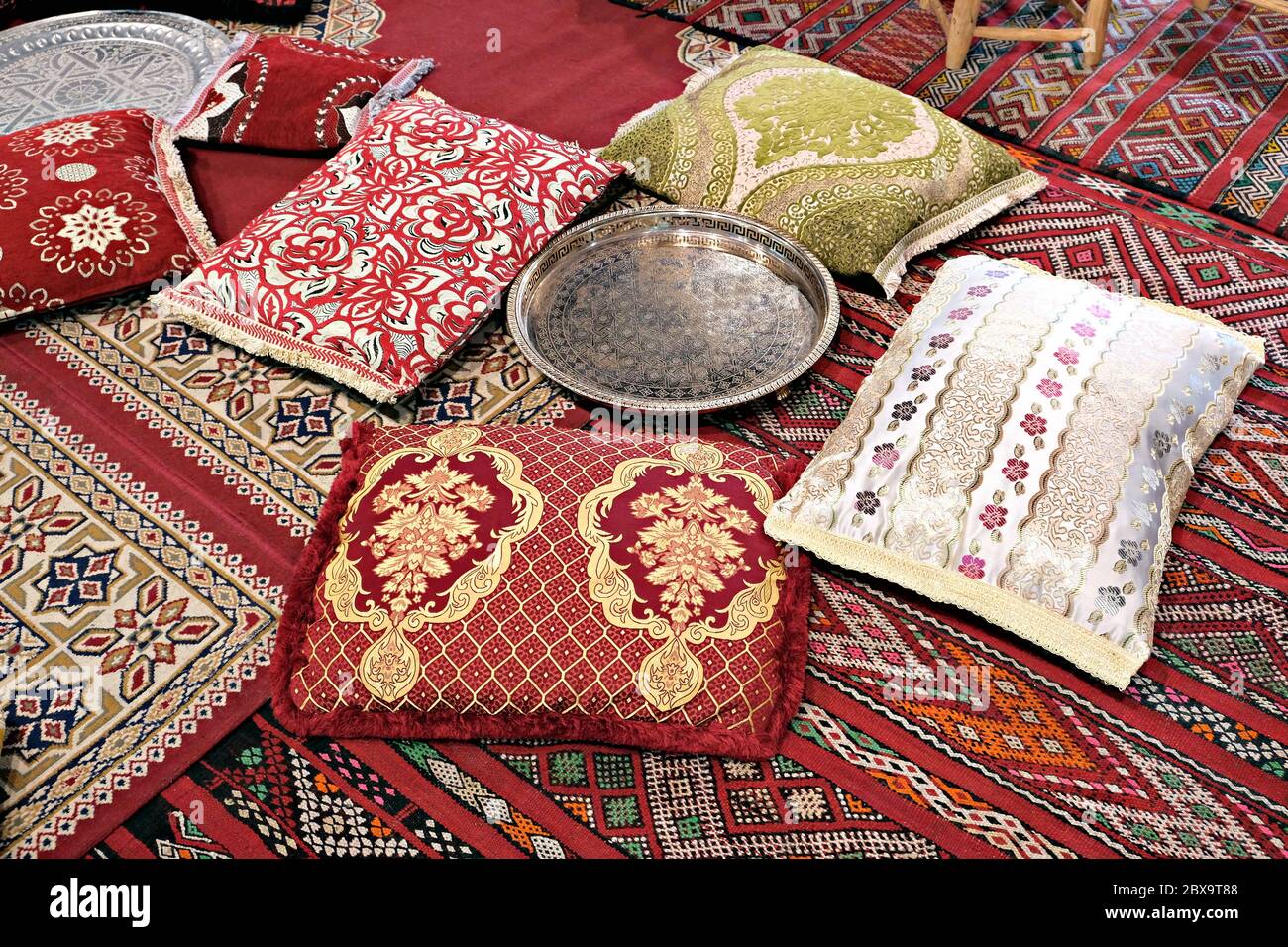 View of the floor of an Arabic tea room with carpets and cushions Stock ...