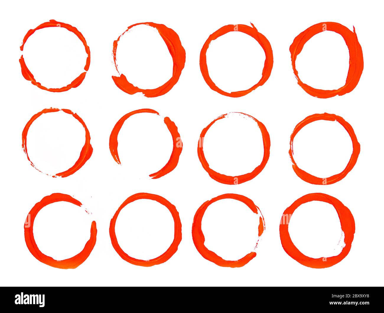 red circular brushstroke or circle print. white paint on a black ...