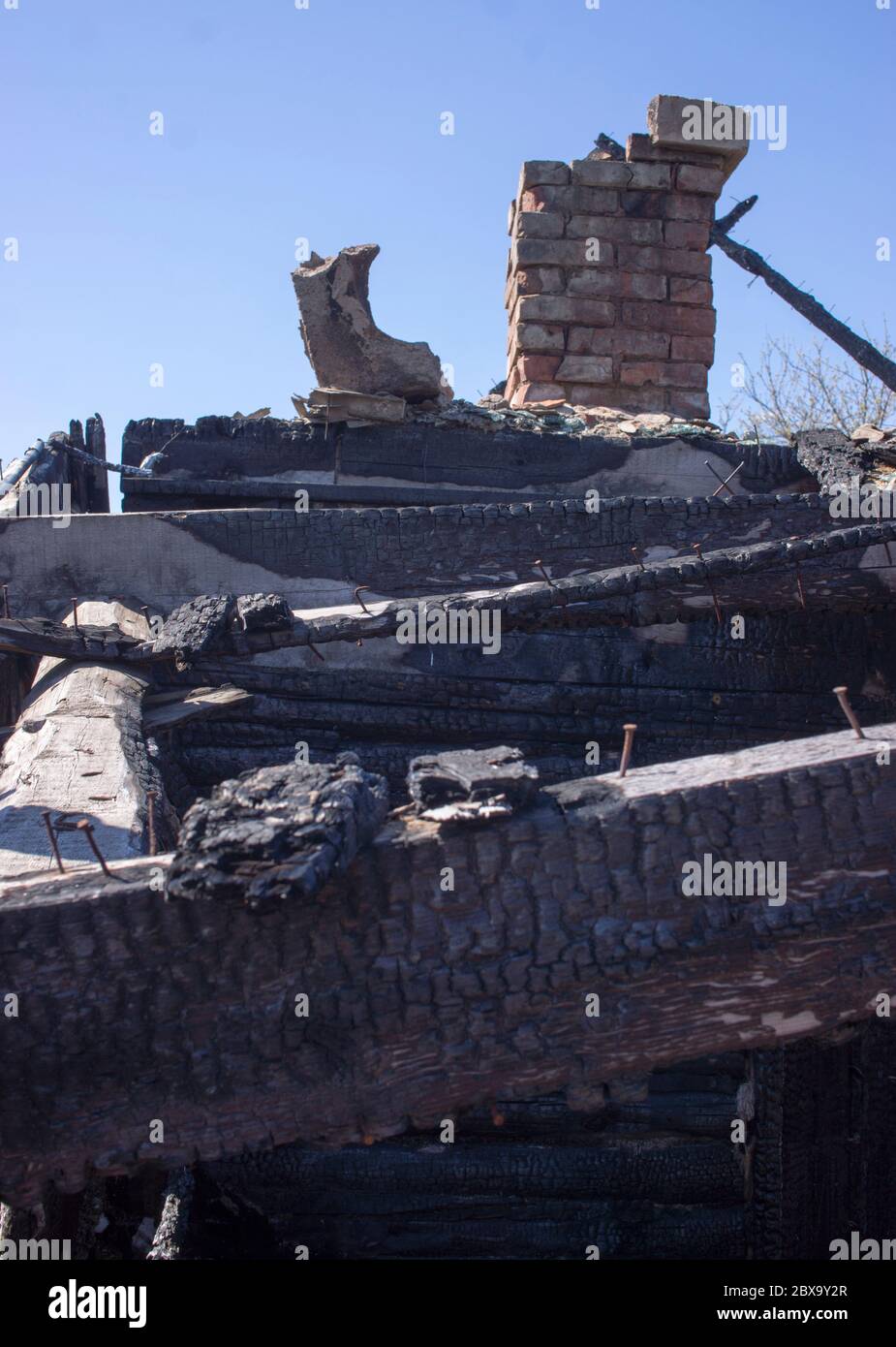 Natural fire ashes with dark grey black coals texture. It is a ...