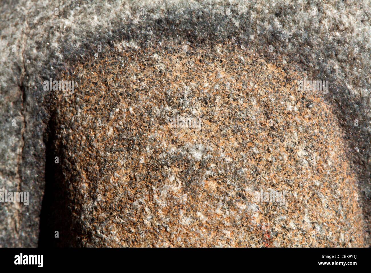 Close up on two different colors in a stone. Probably two different ...