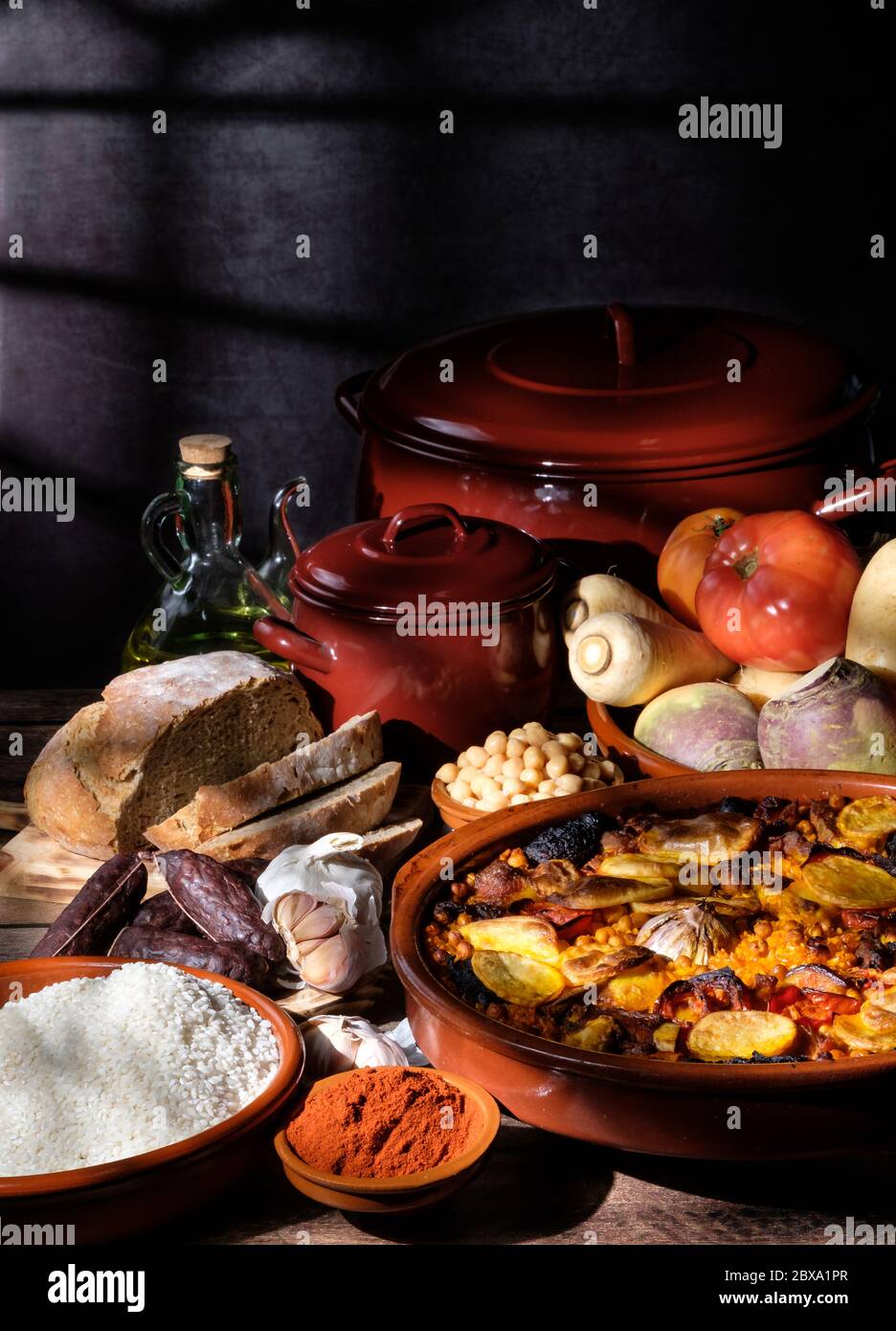 Valencian baked rice at oven with pork, blood sausage garlic tomato ...