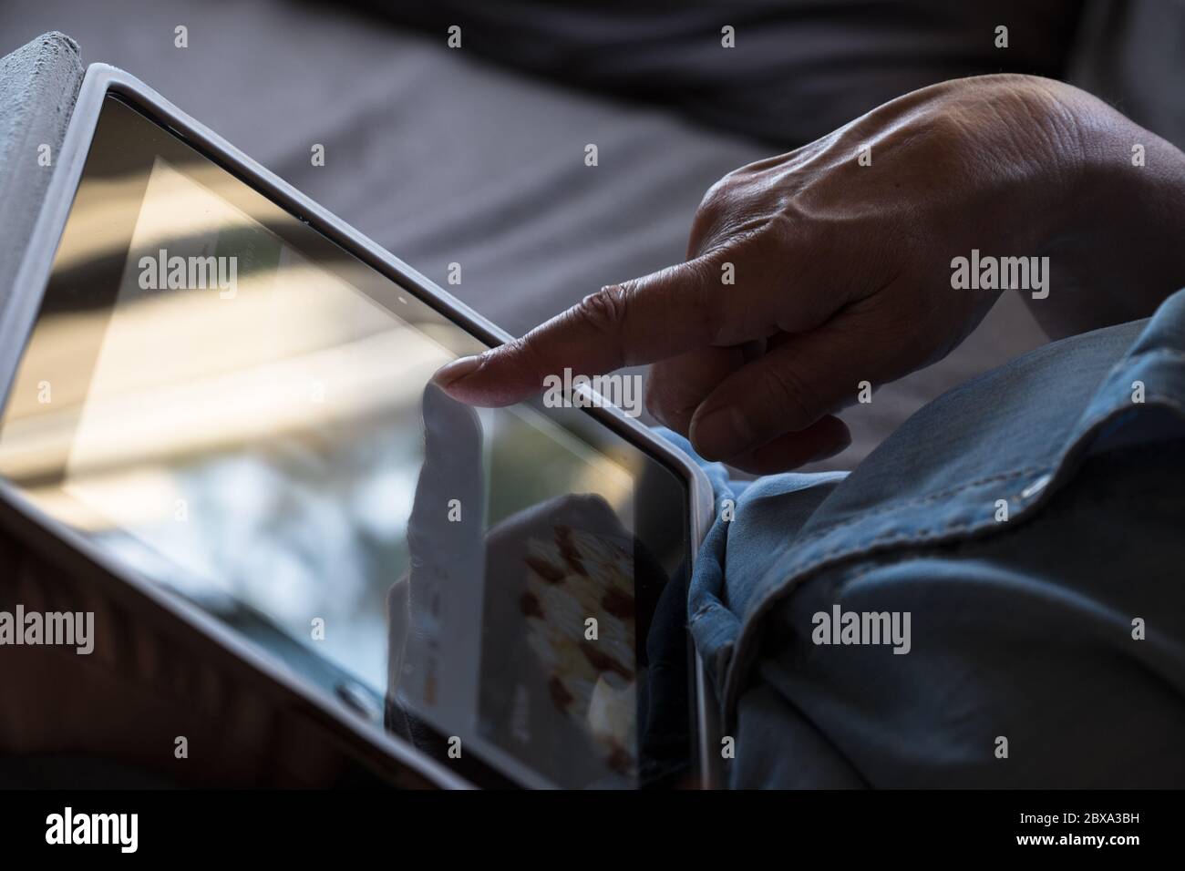 Looking through a computer screen hi-res stock photography and images ...