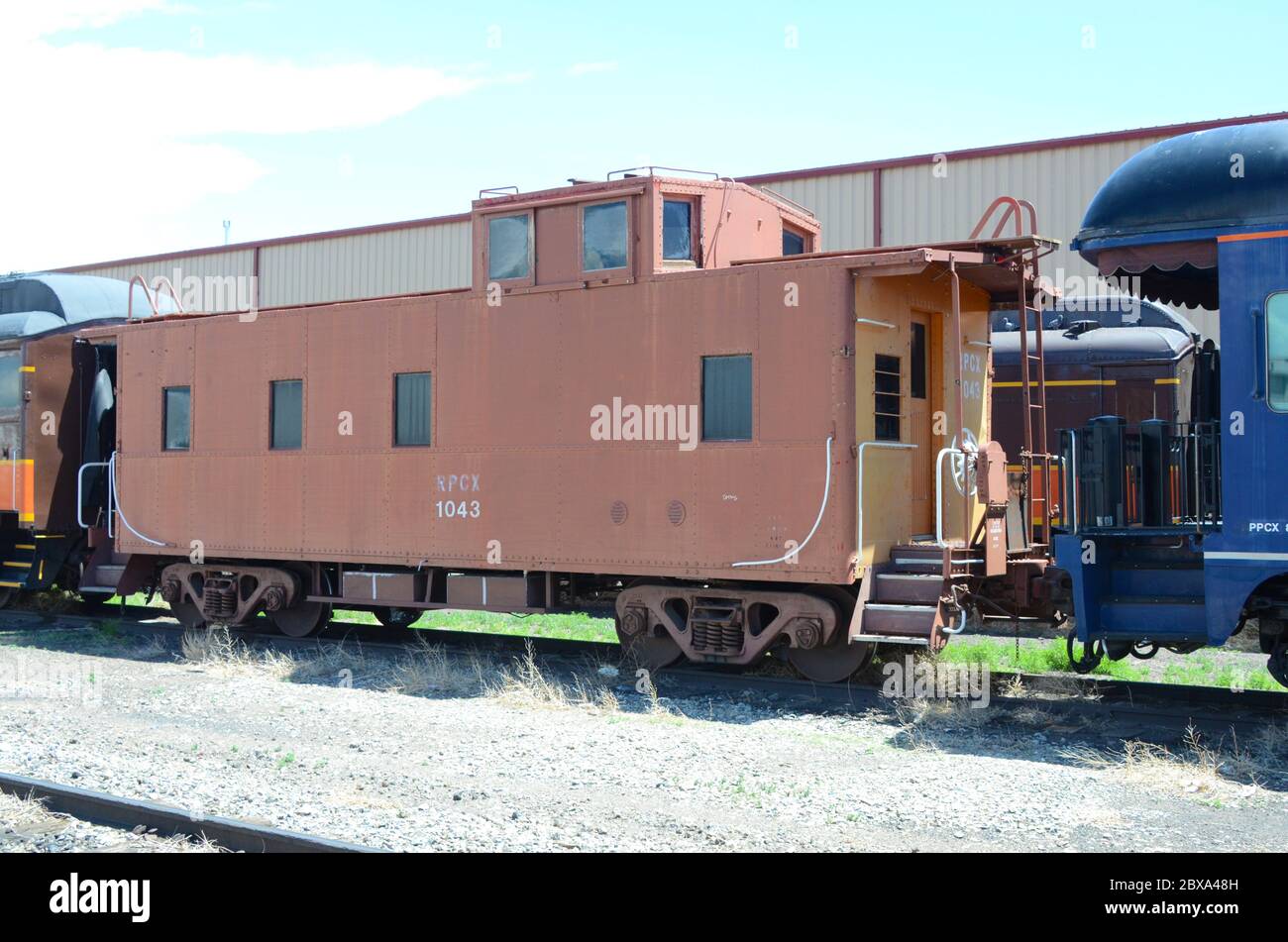 Old train cars, and locomotives parked on the tracks in Alamosa ...