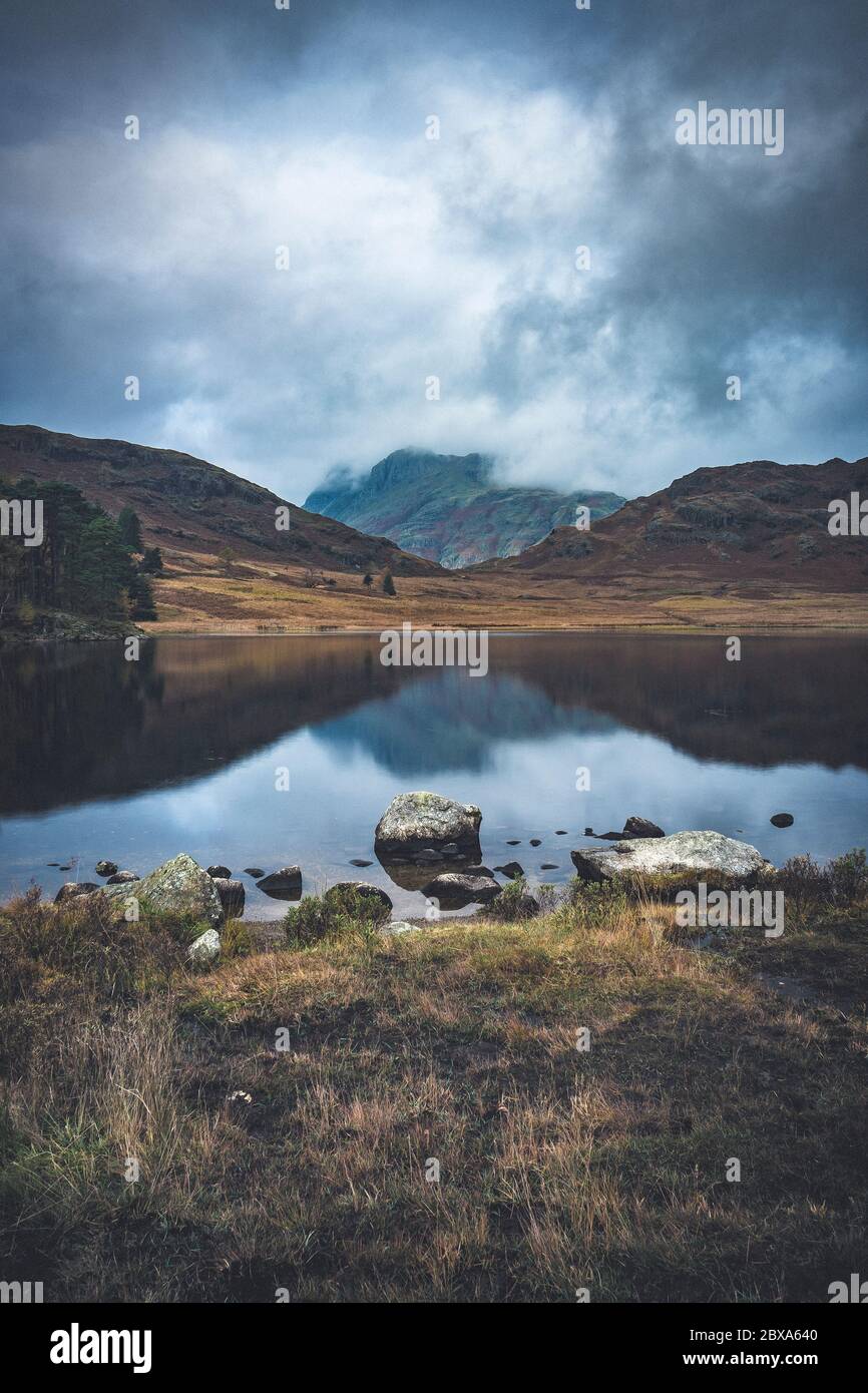 Reflections on a lake Stock Photo - Alamy