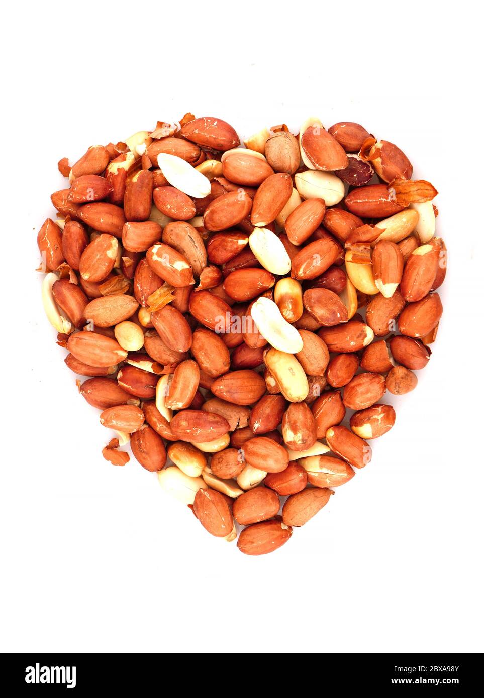 Organic unsalted Peanuts in heart symbol isolated on white background ...