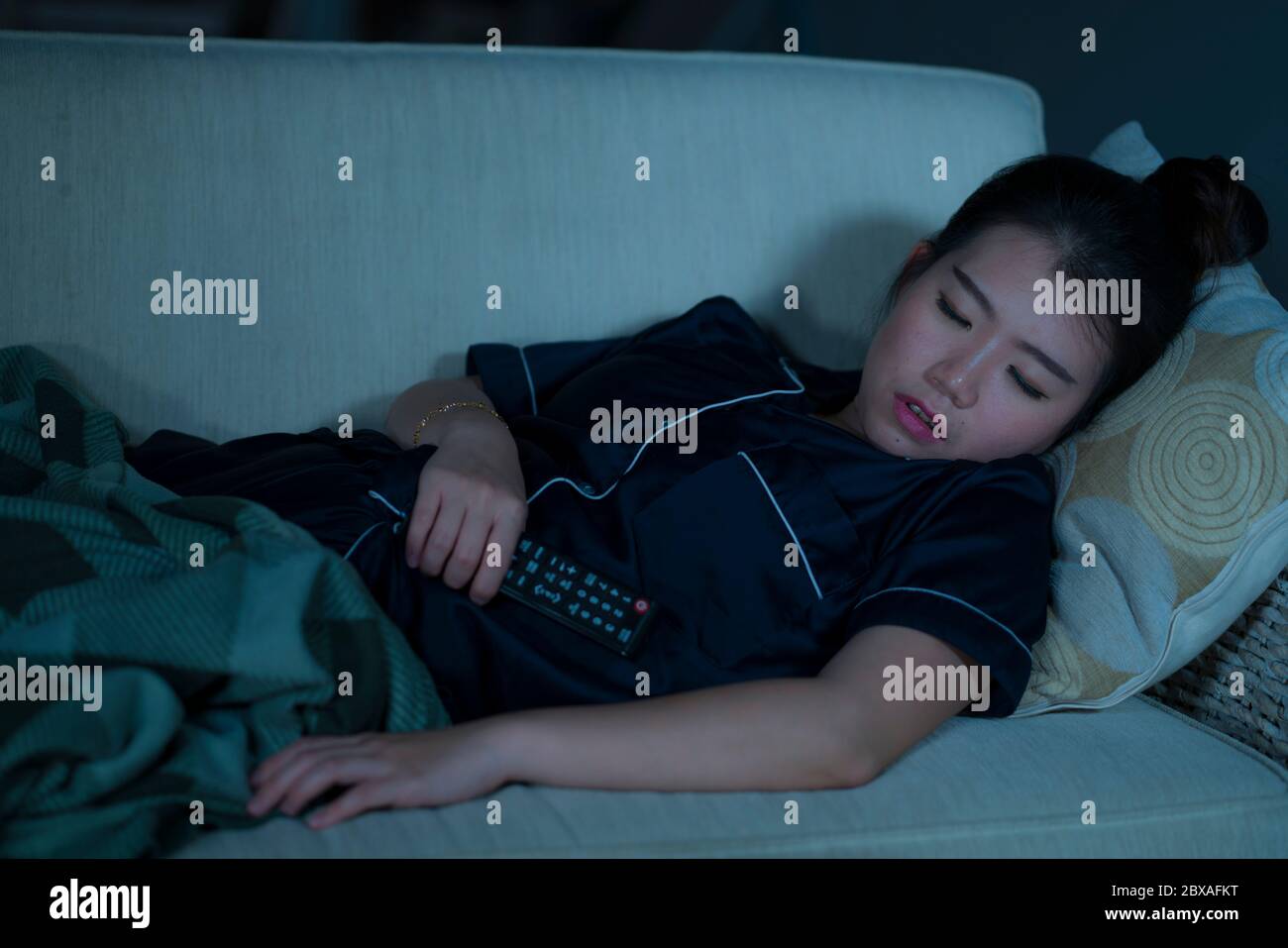 Falling asleep watching tv hi-res stock photography and images - Alamy