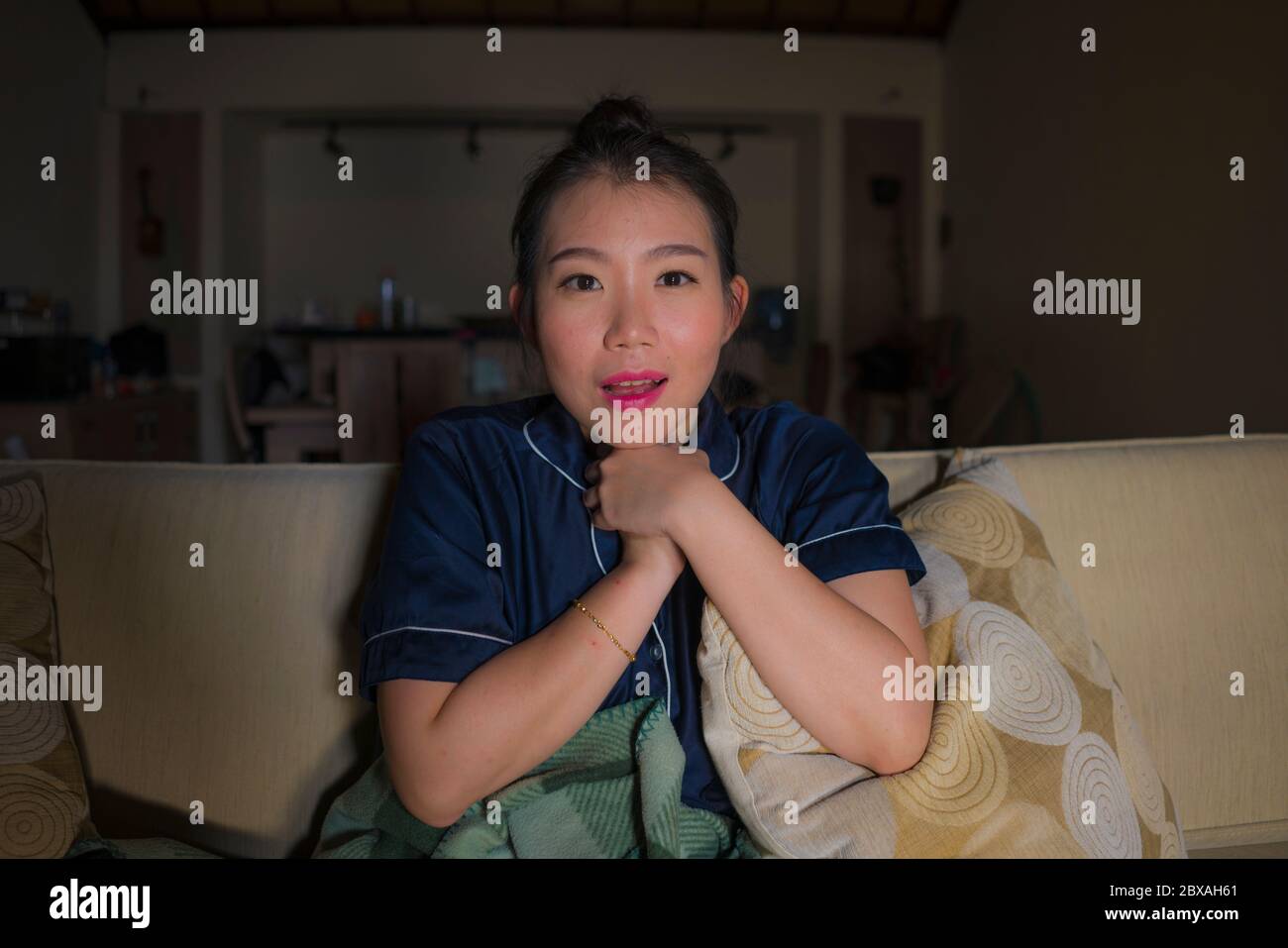 Young Beautiful Happy And Relaxed Asian Chinese Woman At Home Living