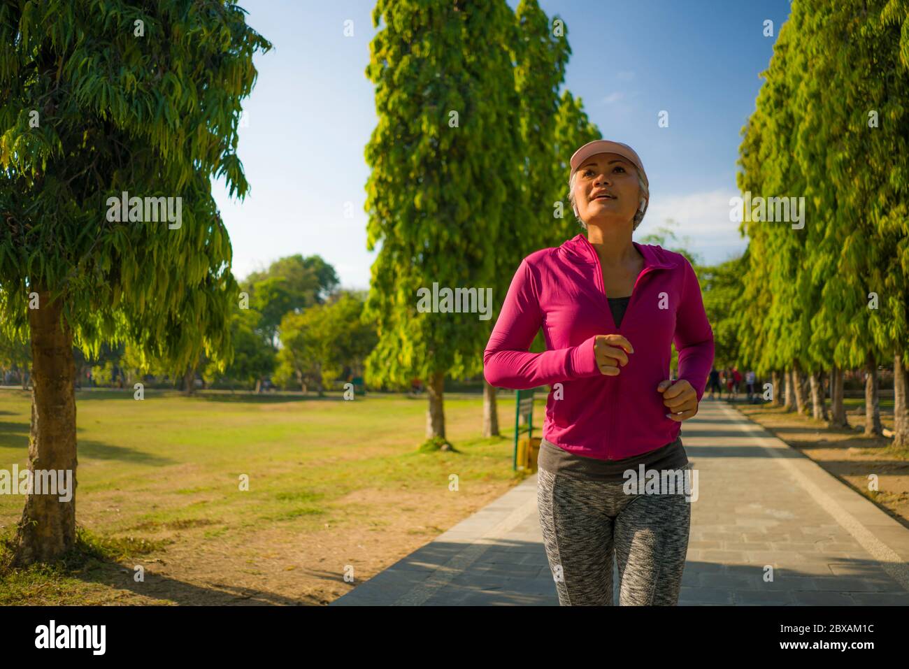 Old lady jogging hi-res stock photography and images - Alamy