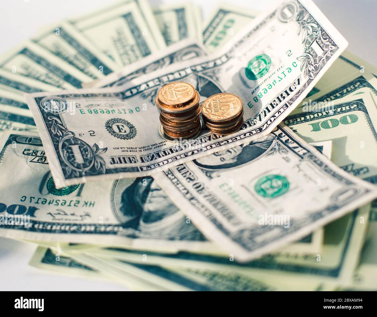 Us dollars falling on table hi-res stock photography and images - Alamy