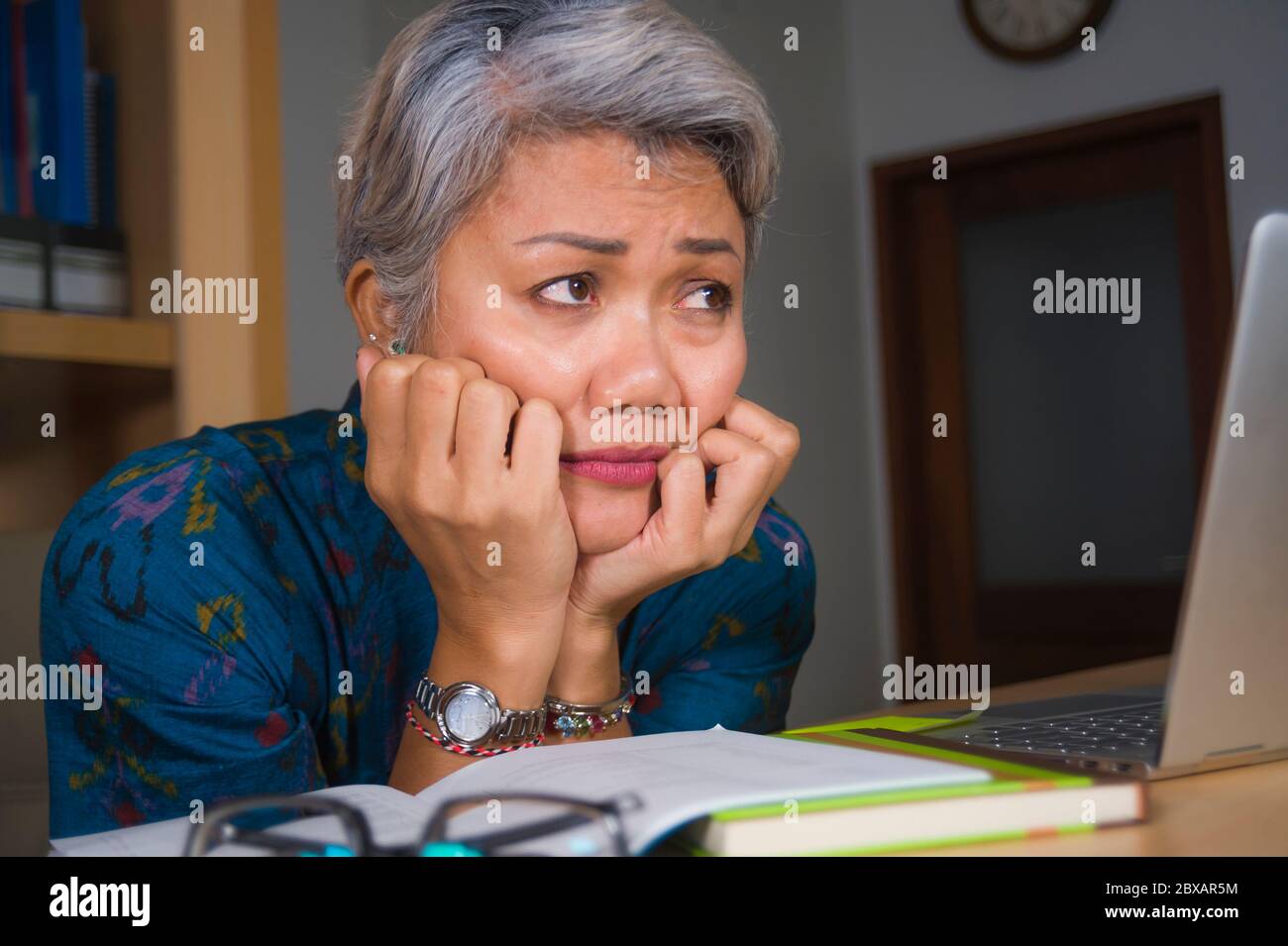 Woman Crying Desk High Resolution Stock Photography and Images - Alamy