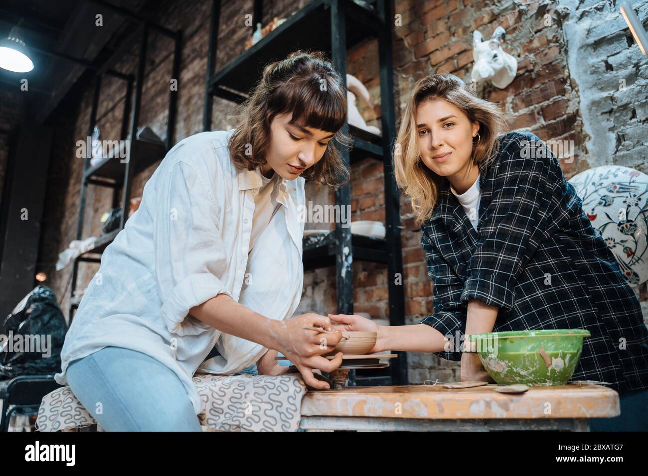 Making a handmade clay pot. Pottery lesson, hobby Stock Photo - Alamy