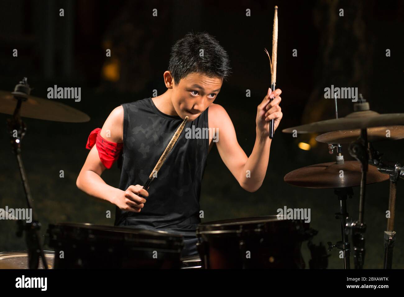 Teenage Boy Playing Drums