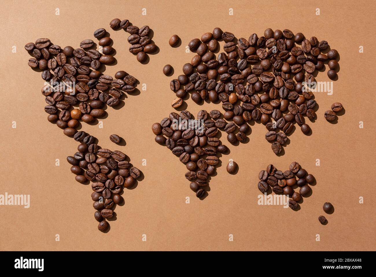 World map made with coffee beans on brown background Stock Photo - Alamy