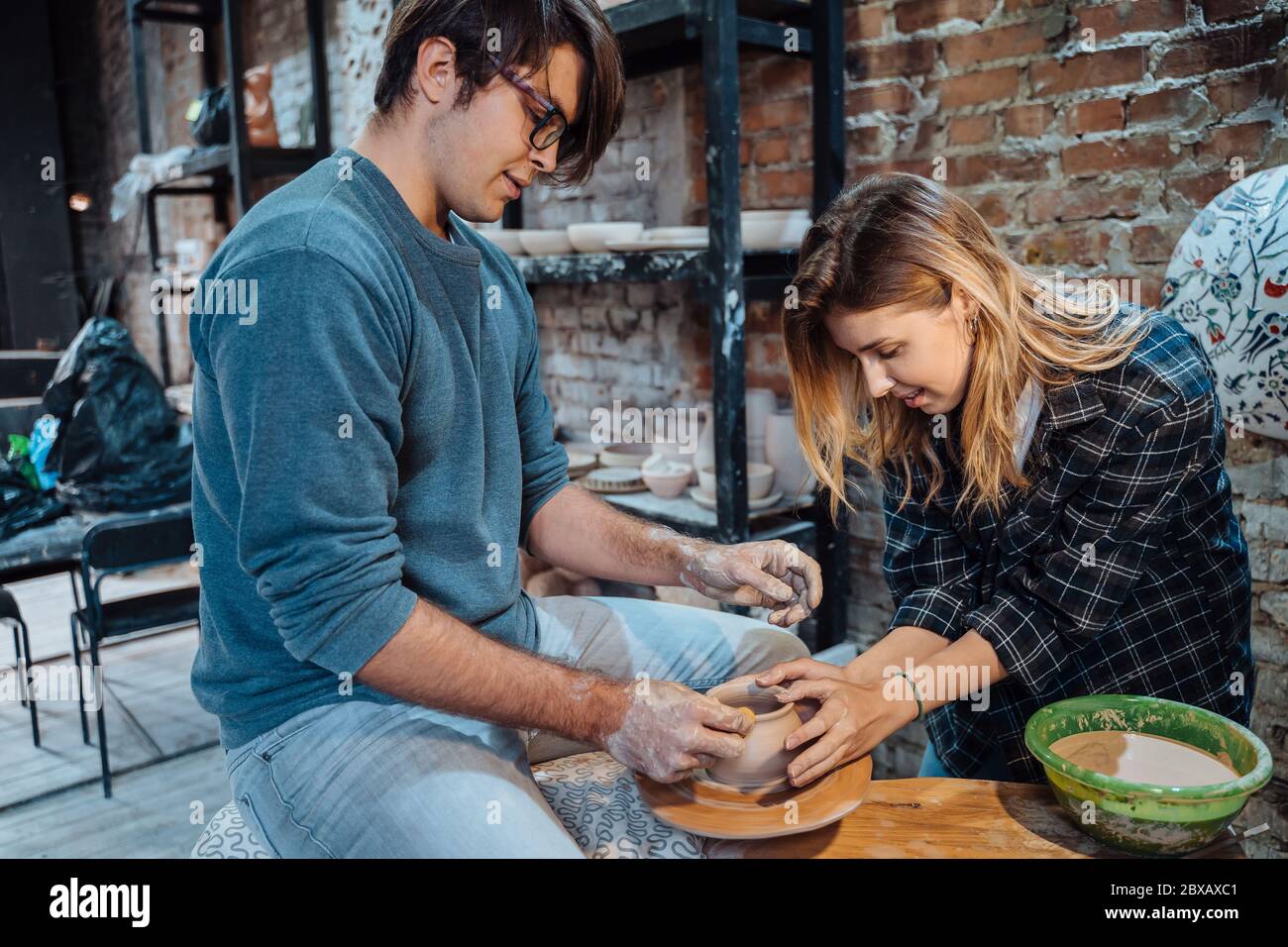 Making a handmade clay pot. Pottery lesson, hobby Stock Photo - Alamy