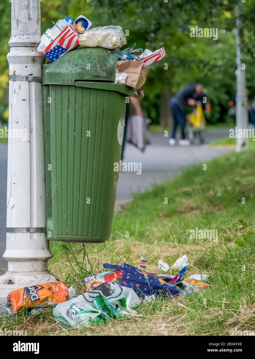 Bucharest/Romania - 05.29.2020: Green garbage bin full of trash ...