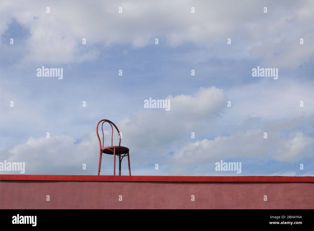 Chair on roof hi-res stock photography and images - Alamy