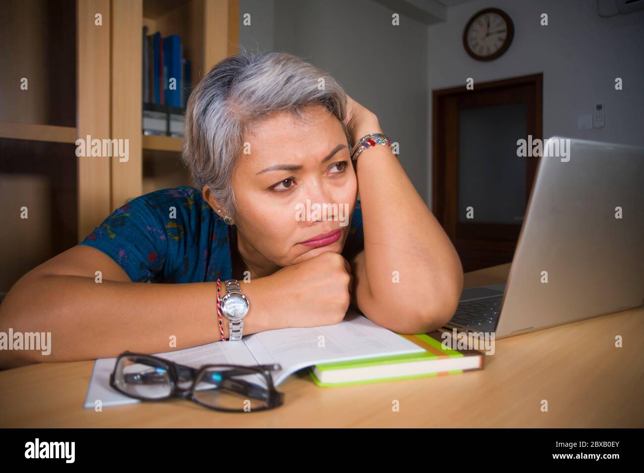 office lifestyle portrait of sad and depressed middle aged attractive ...