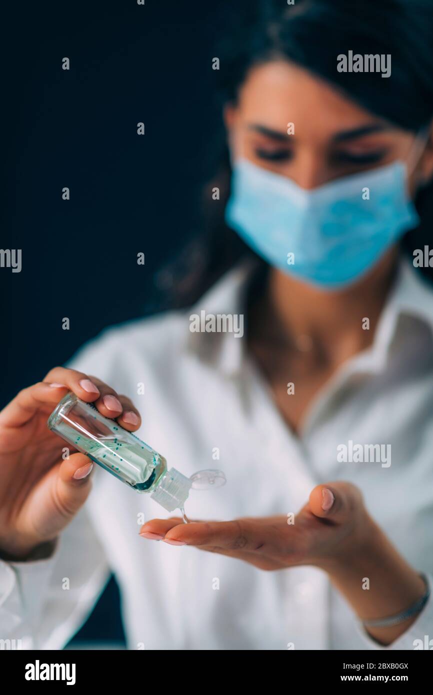 Sanitising hands hi-res stock photography and images - Alamy