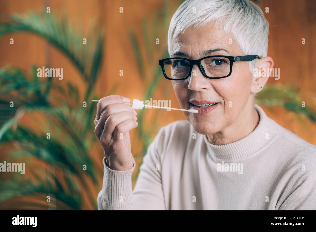 DNA testing using saliva sample Stock Photo - Alamy