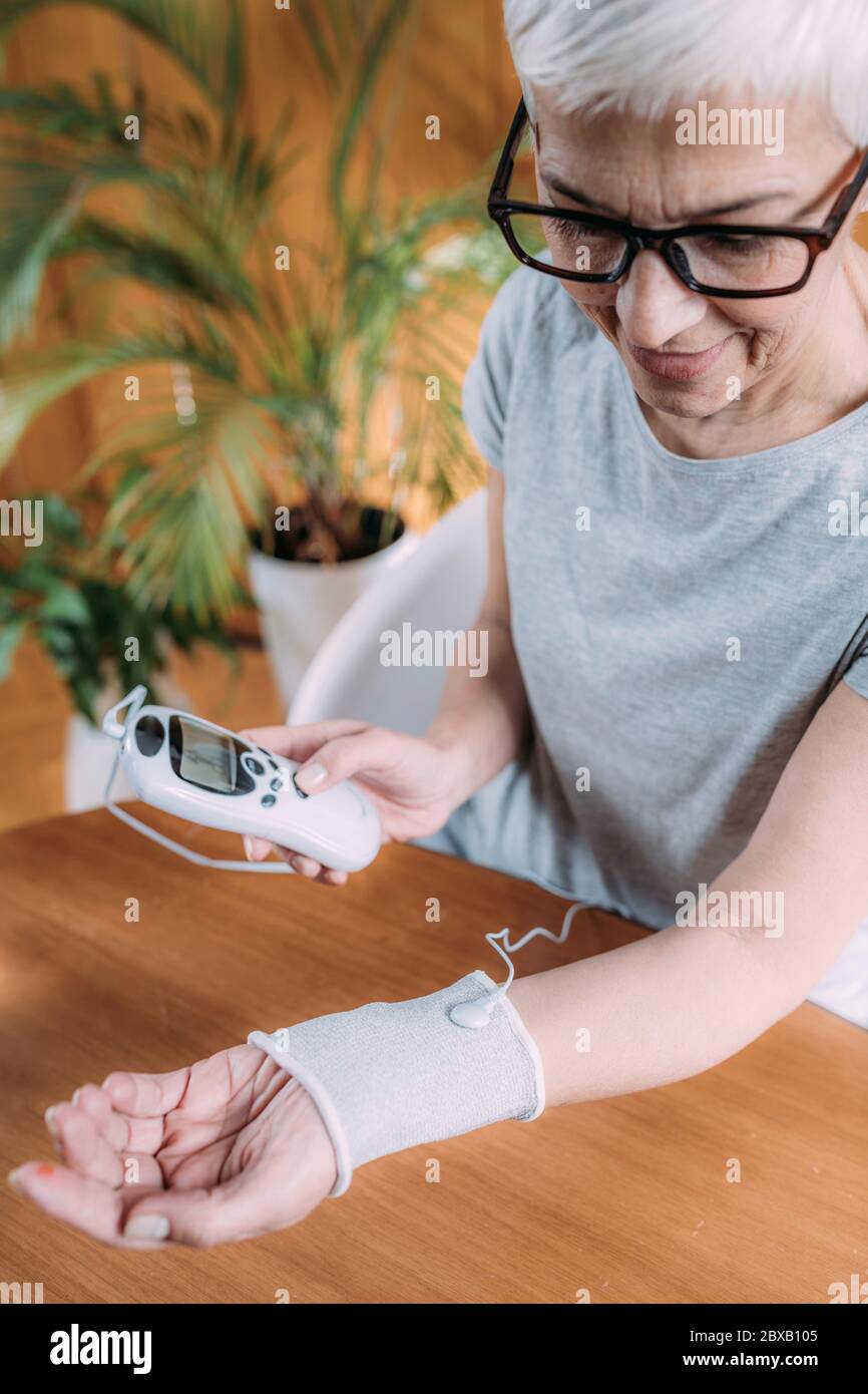 Nerve stimulation wrist hi-res stock photography and images - Alamy