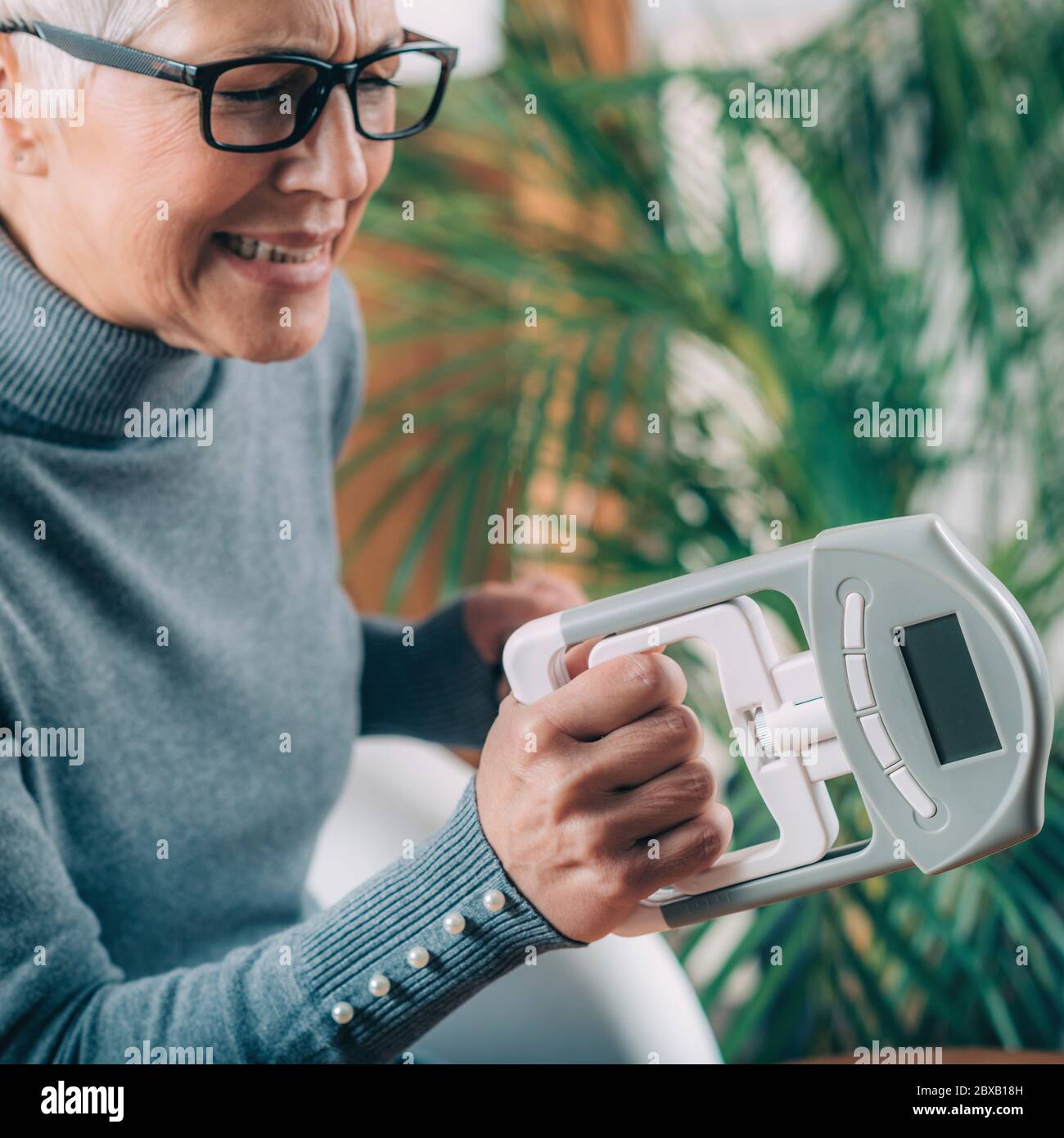 Hand grip dynamometer hi-res stock photography and images - Alamy