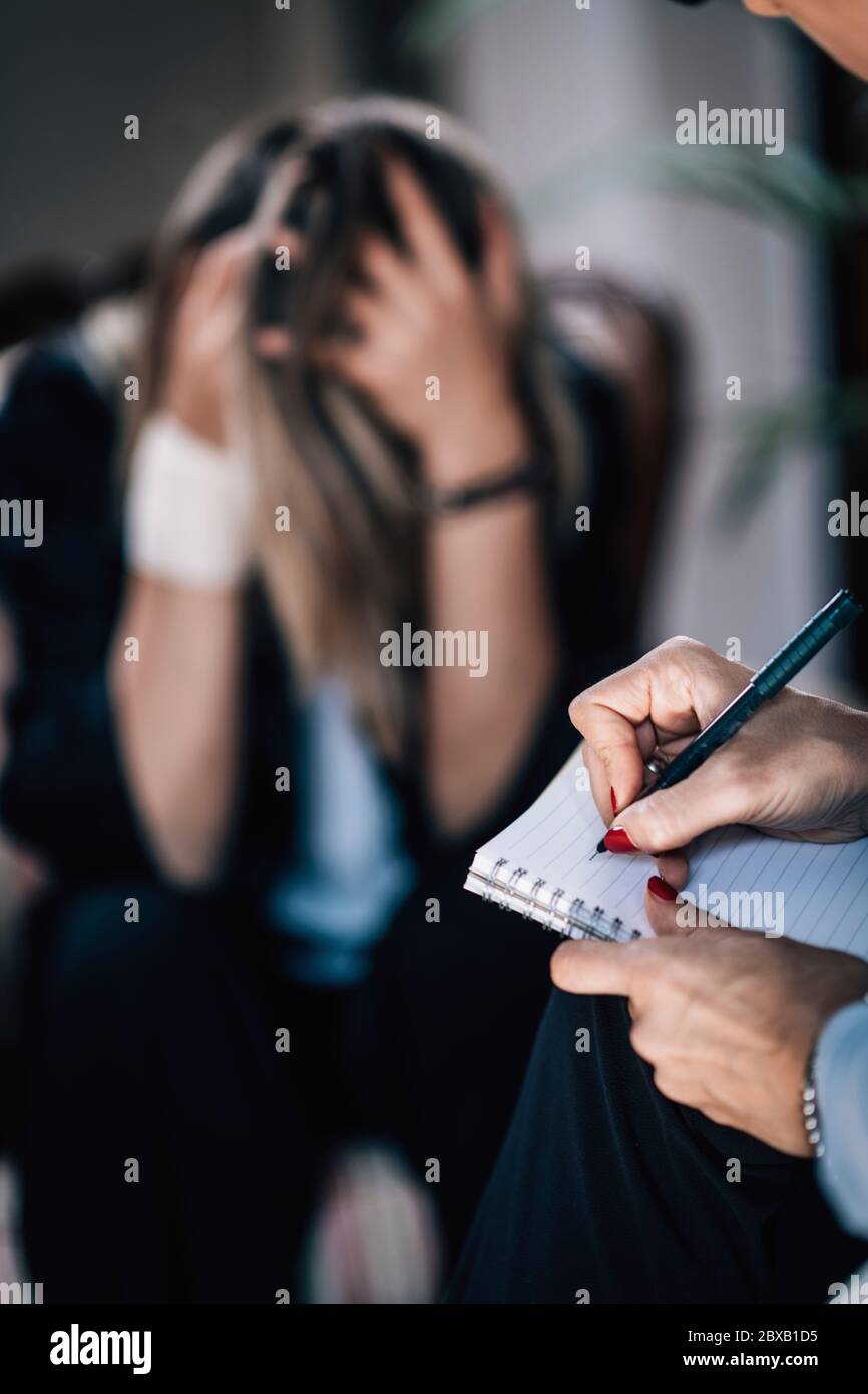 Professional therapist taking notes hi-res stock photography and images ...