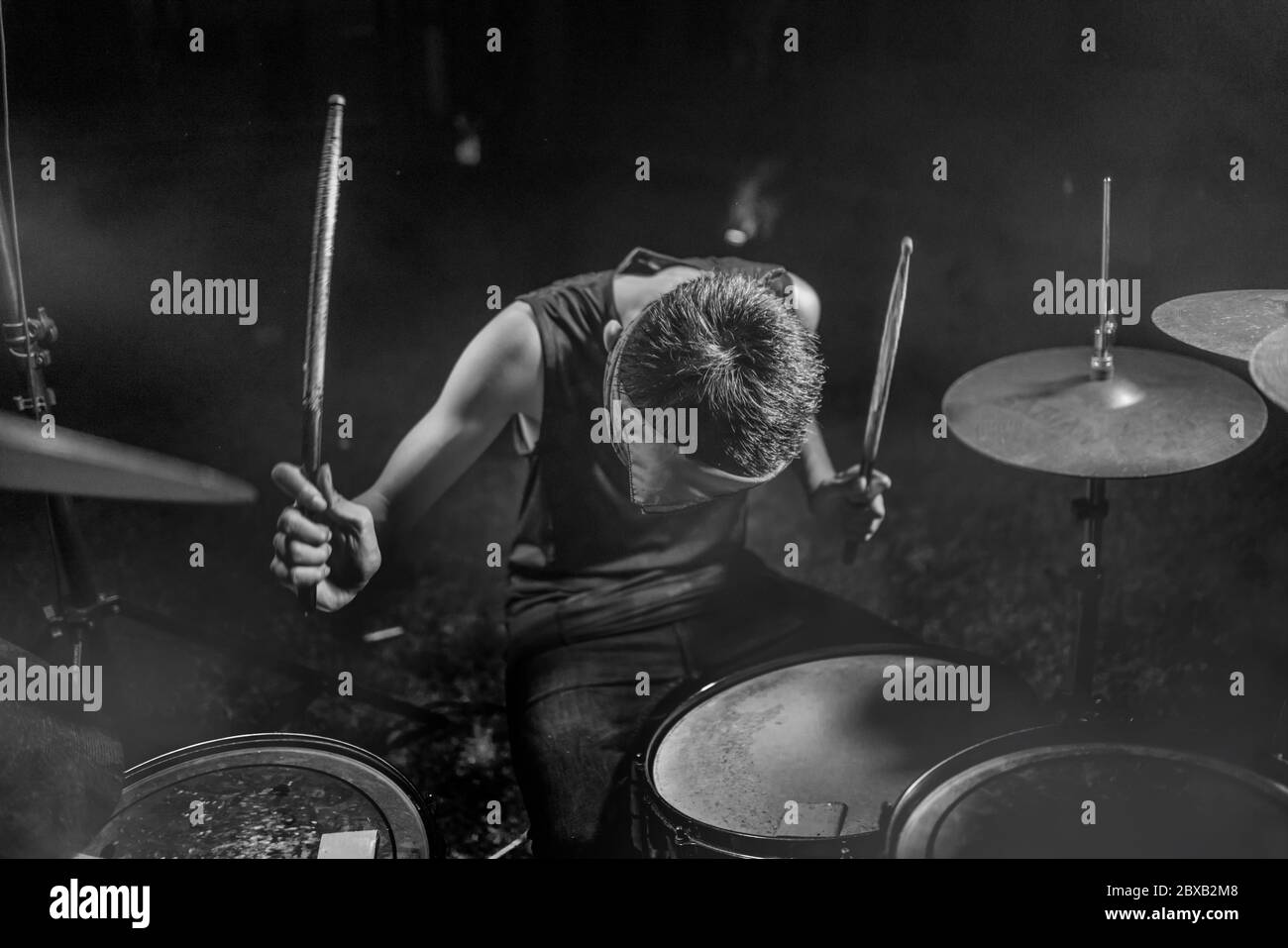 young boy as talented rock band drummer . Handsome and cool Asian ...