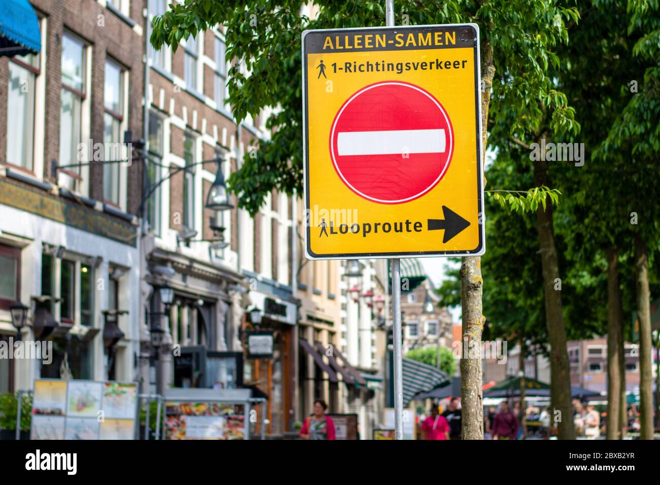Social distancing in the city centre. One way trail sign during ...