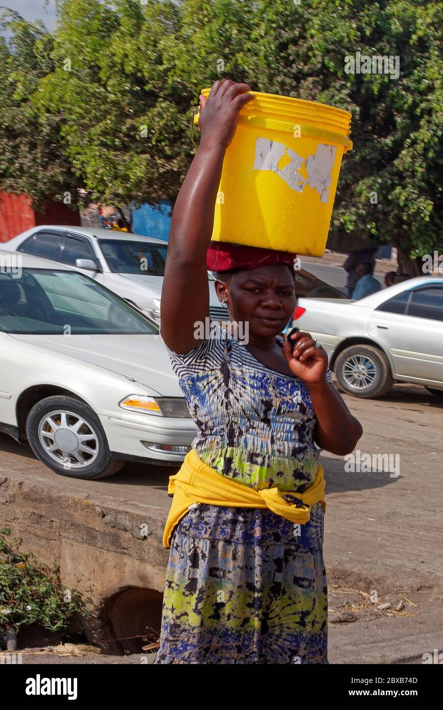 Woman bucket head hi-res stock photography and images - Alamy