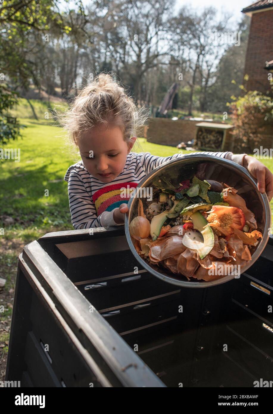 Composting bin girl hi-res stock photography and images - Alamy