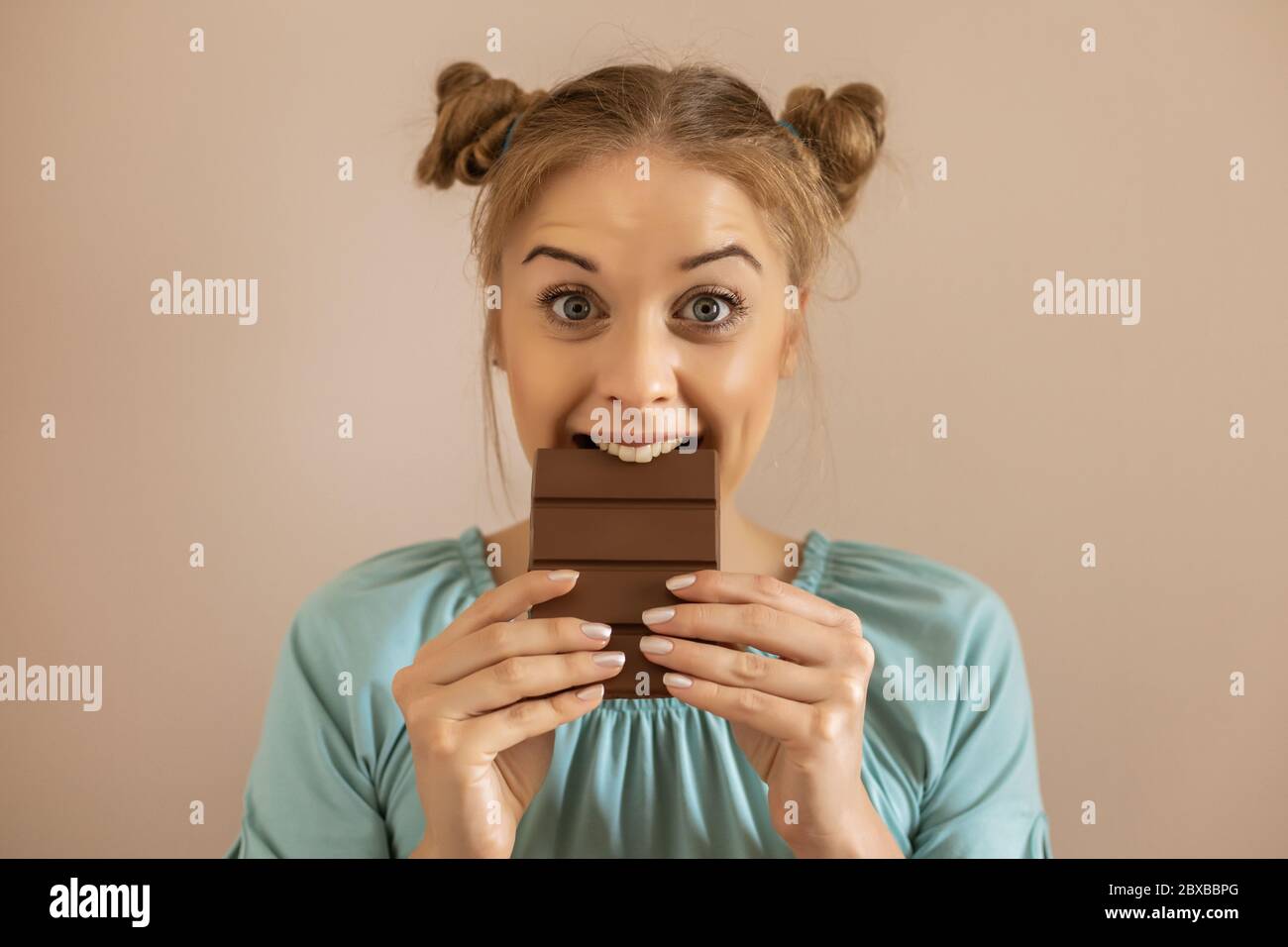 Woman Laughing Chocolate High Resolution Stock Photography and Images ...