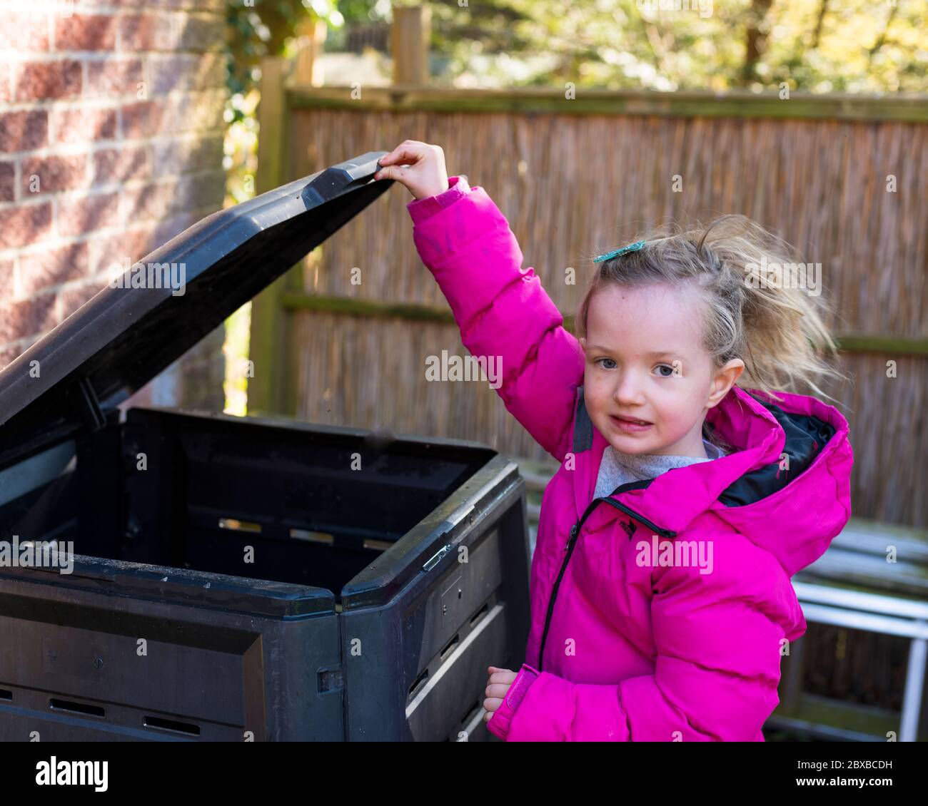Little Black Girl Gardening High Resolution Stock Photography and ...