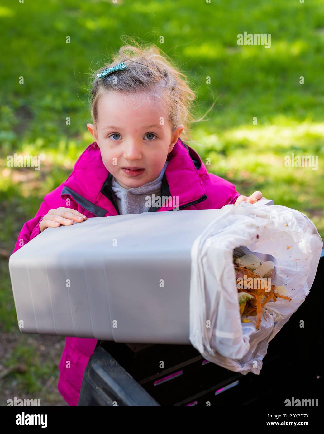 Composting bin girl hi-res stock photography and images - Alamy