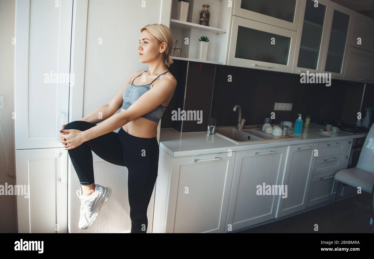 Legs woman kitchen hi-res stock photography and images - Alamy