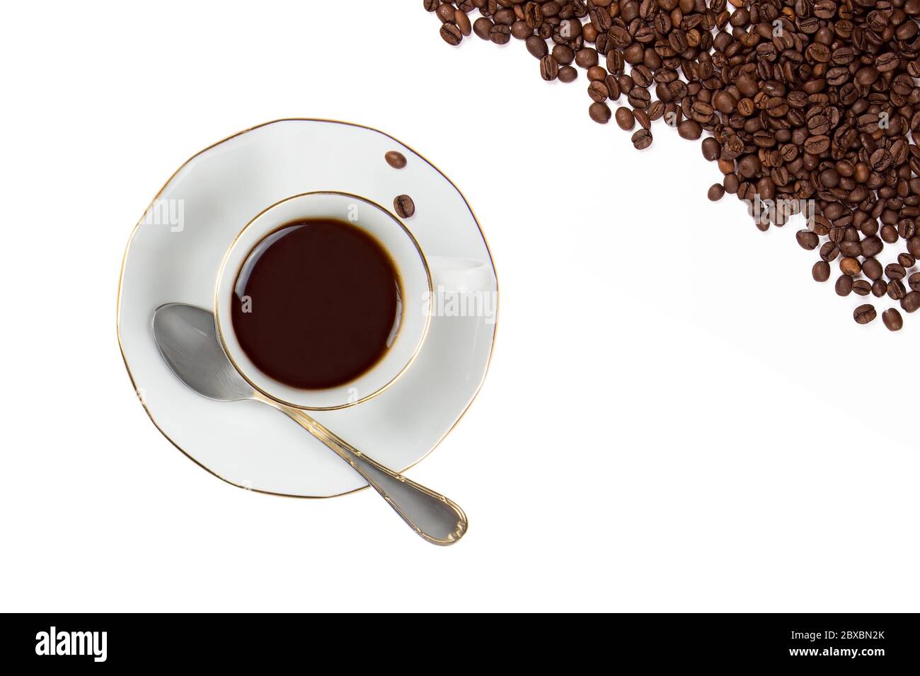 Aerial view of cup of coffee and coffee beans. Still life isolated on ...