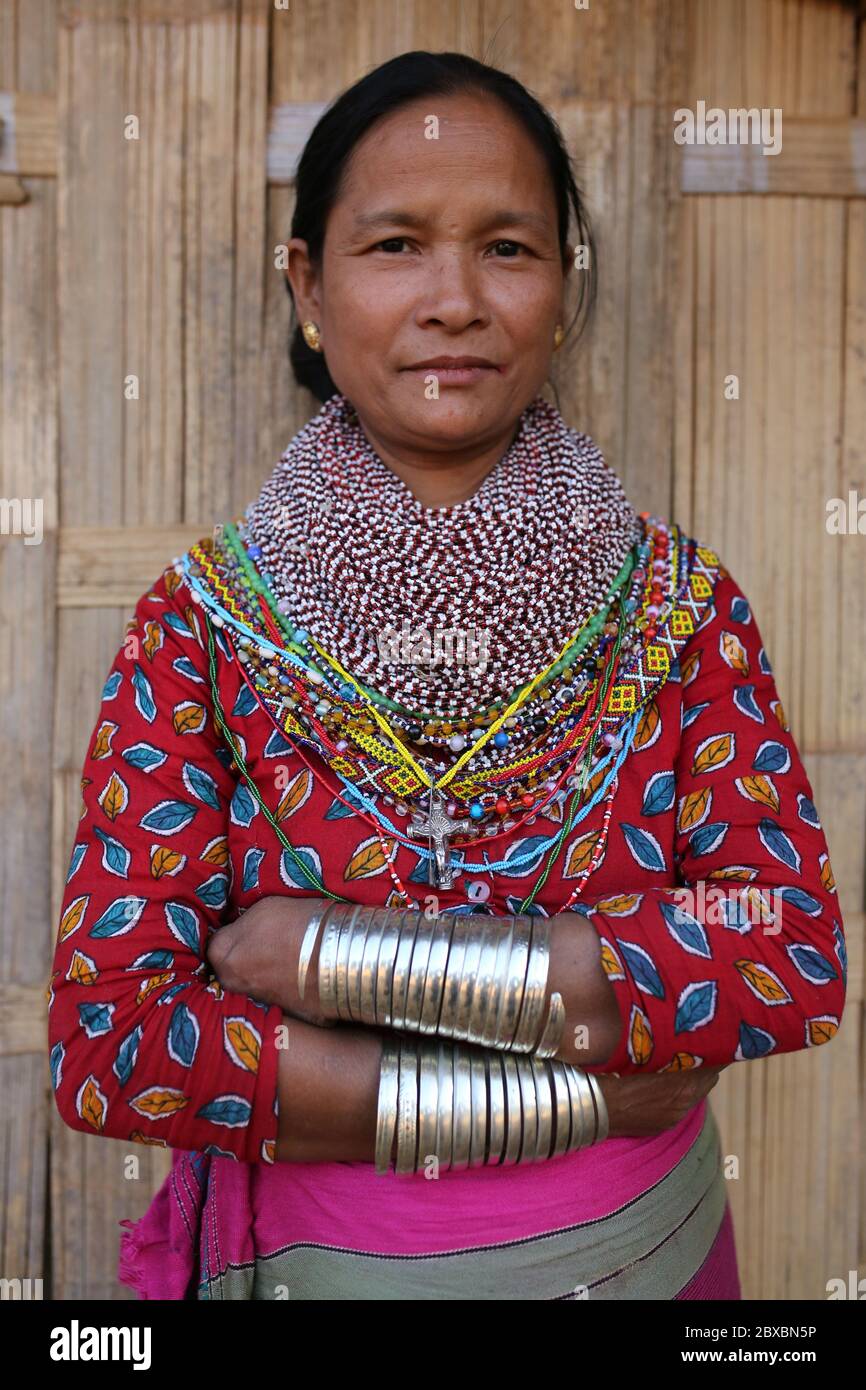 An indigenous woman poses at a village in Thanchi in Bandarban ...