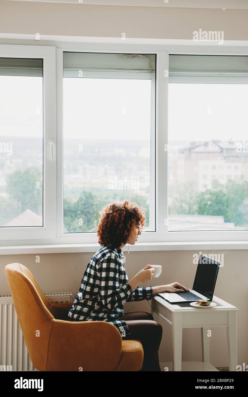 Working remotely with cell phone hi-res stock photography and images ...